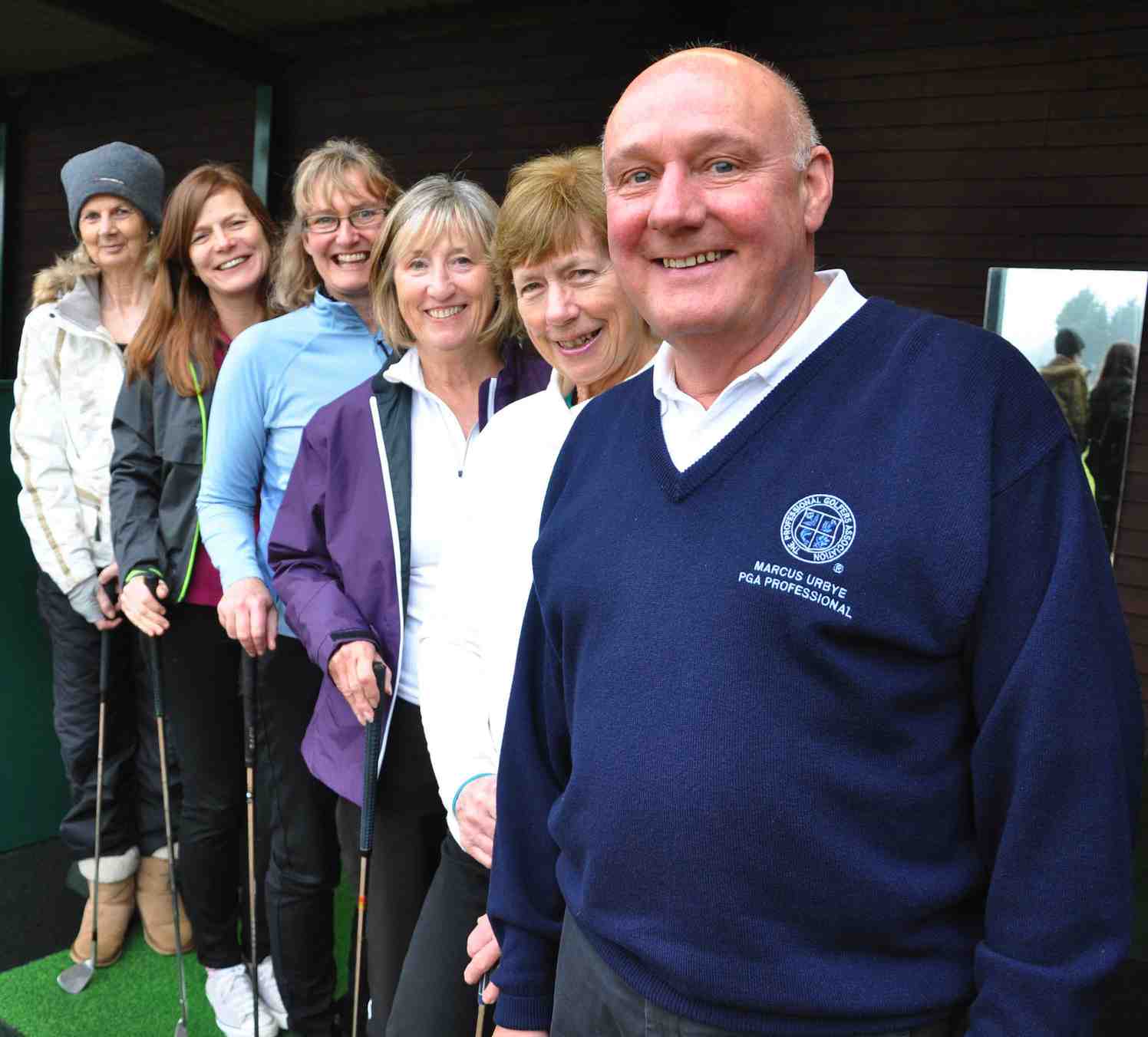 Swinging at Parley Golf Centre - Dorset View