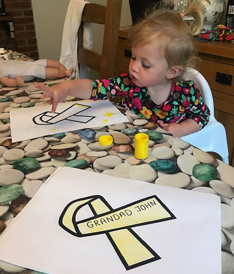 Display yellow ribbons to remember lost loved ones