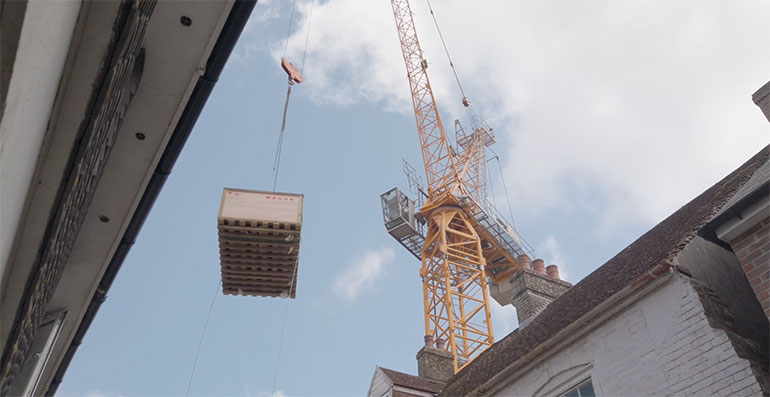 Two large and heavy artefacts airlifted by crane into Dorset Museum