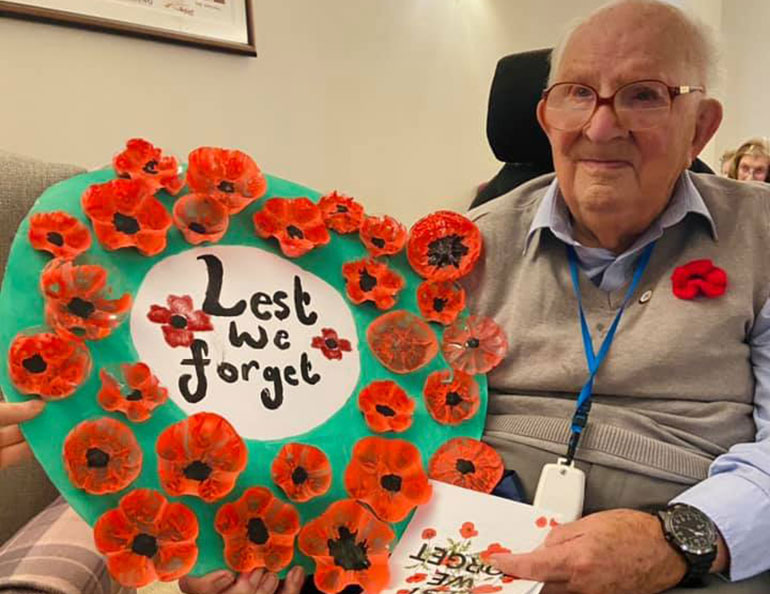Care home residents in Bournemouth and Poole make poppy wreaths