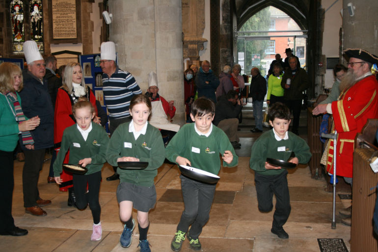 Rain didn’t stop Wimborne Pancake Race