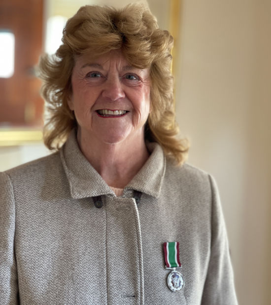 Ferndown Home Library Service volunteers receive long service medals